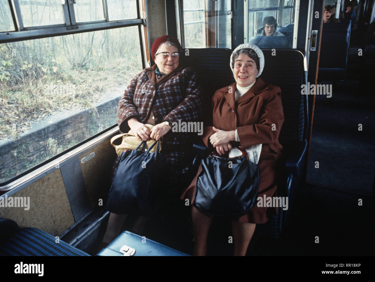 Passengers in British Rail Diesel Multiple Unit train on the Oxenholme ...