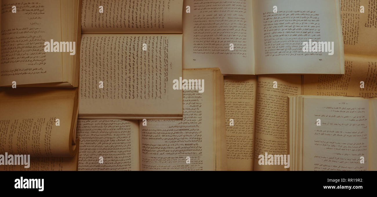 Old open books with text Stock Photo - Alamy