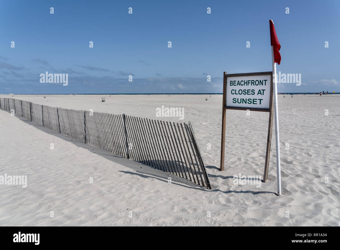 Warning flag sunset background hi-res stock photography and images - Alamy