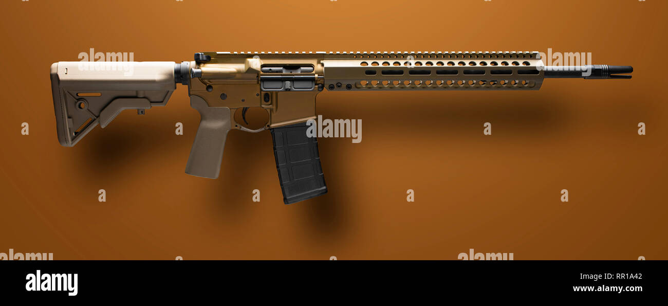 Assault rifle on a tan background with a drop shadow below Stock Photo ...