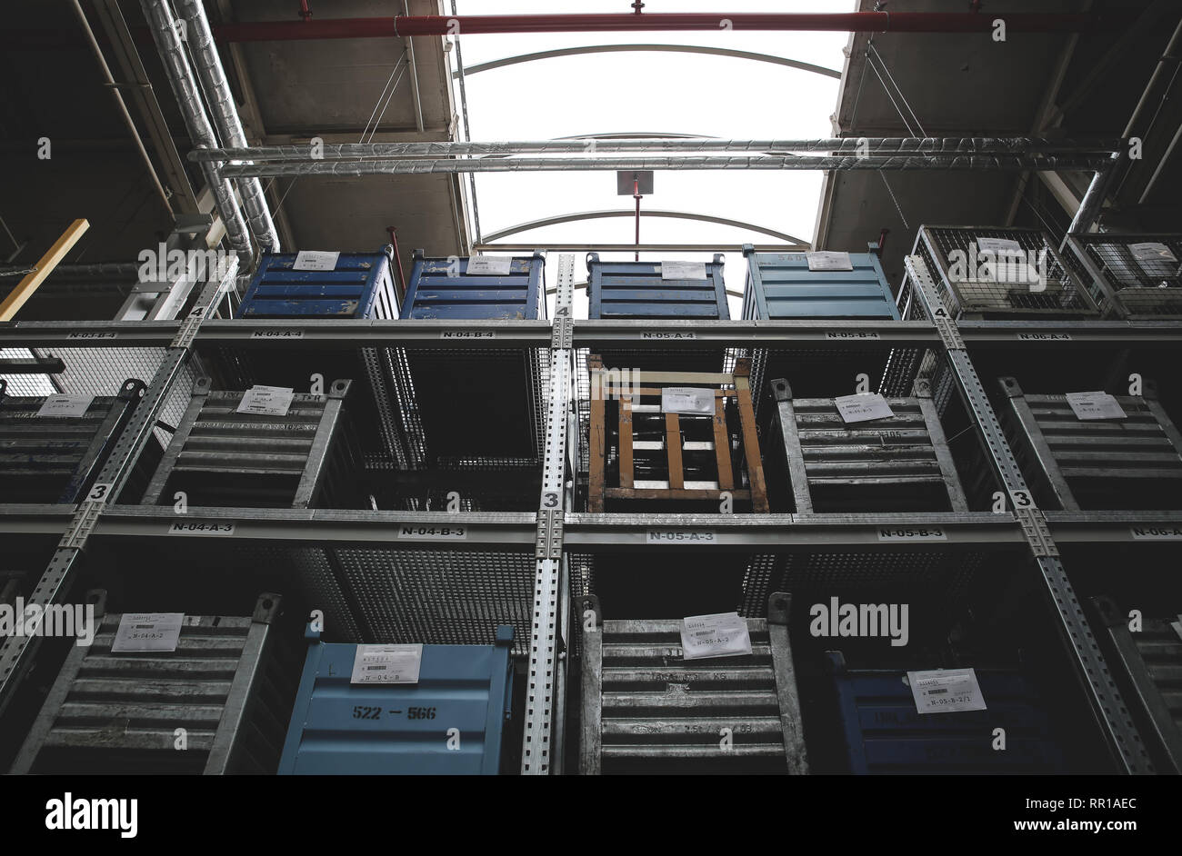 Warehouse framework with crates Stock Photo - Alamy