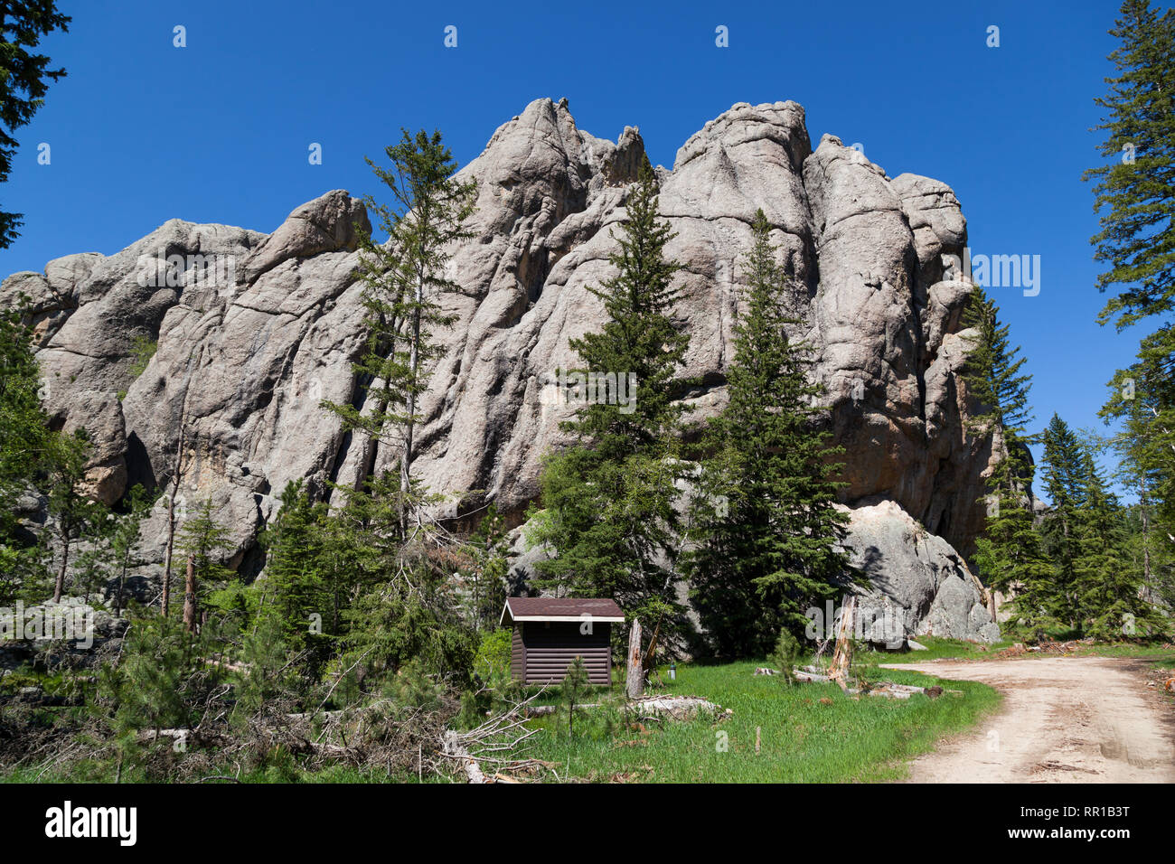The road leading to the trailhead for Little Devils Tower rock feature ...