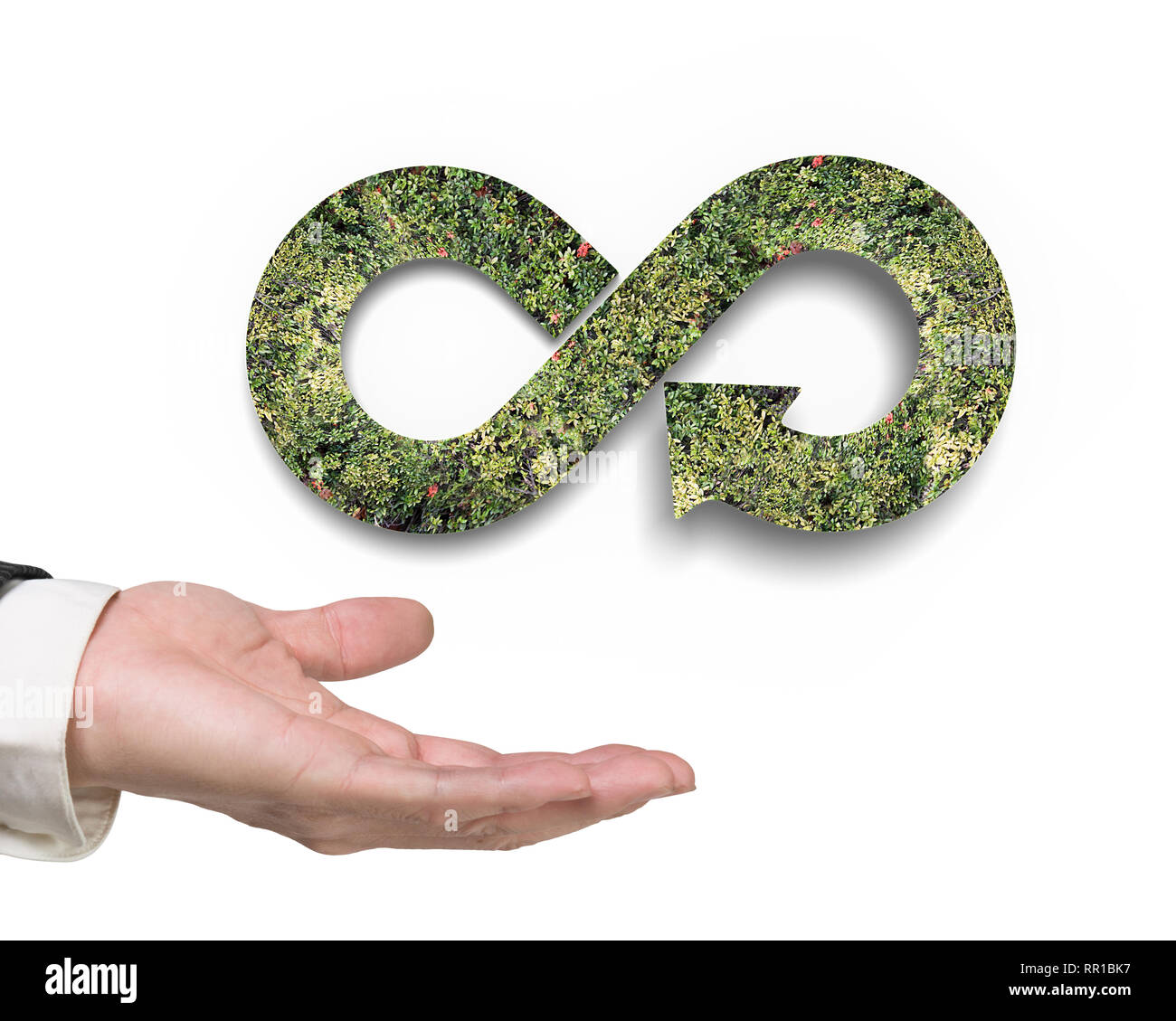 Green circular economy concept. Hand showing arrow infinity symbol with ...
