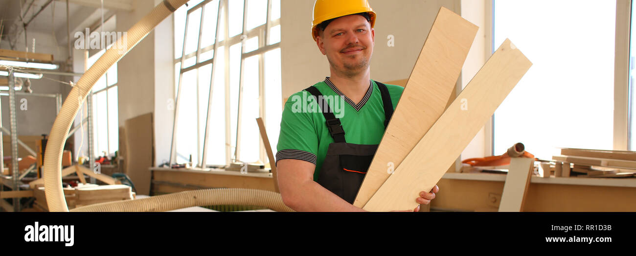 Portrait of a smiling carpenter Stock Photo - Alamy