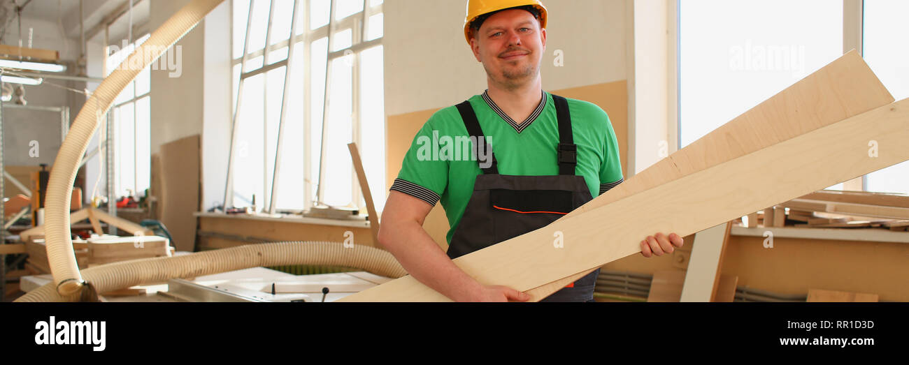 Portrait of a smiling carpenter Stock Photo - Alamy