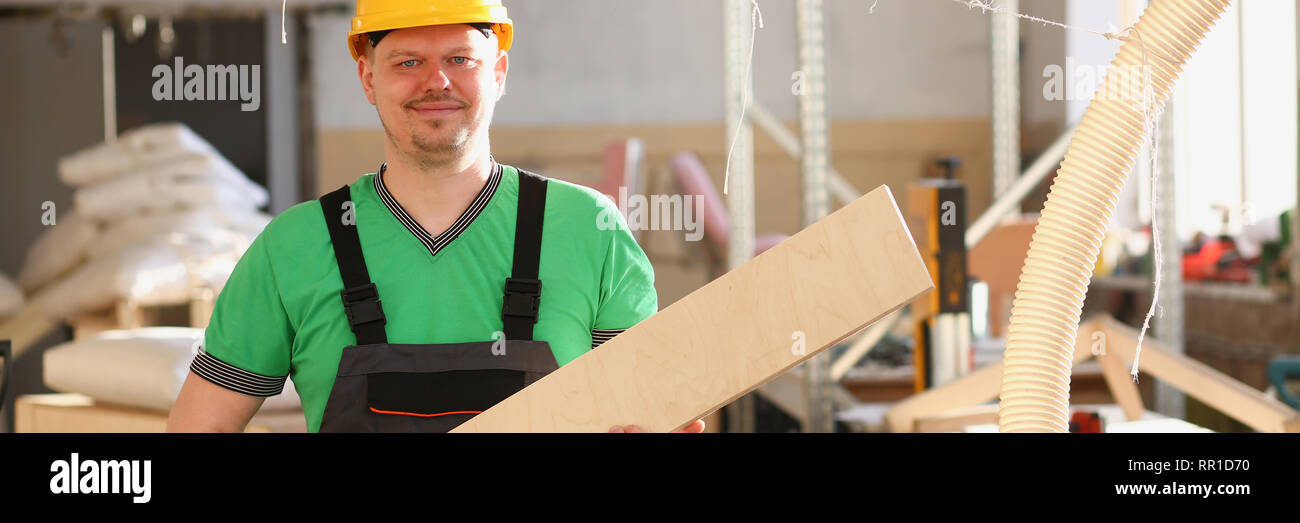 Portrait of a smiling carpenter Stock Photo - Alamy