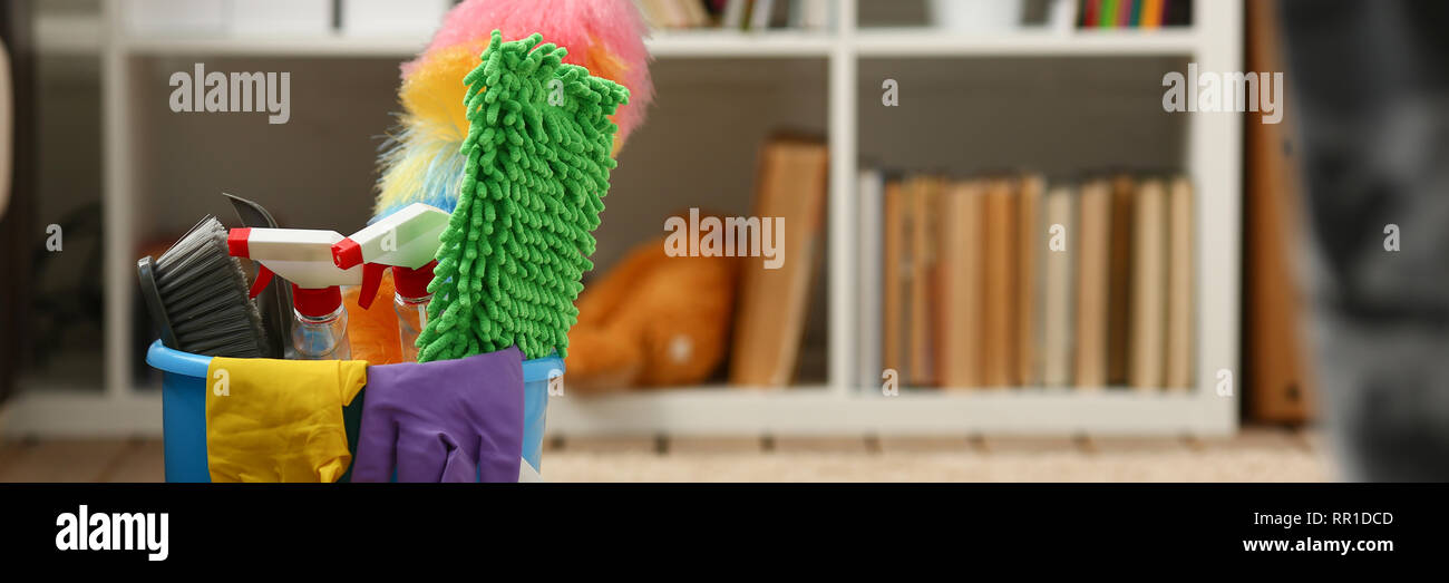 A bucket with cleaning equipment stands Stock Photo - Alamy