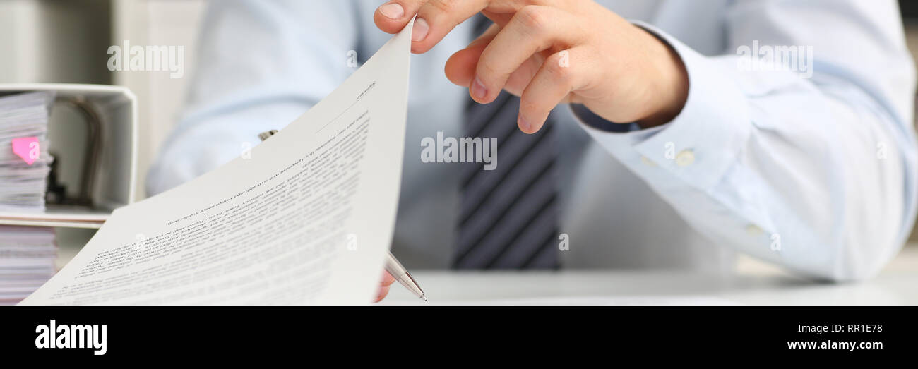 Male hands hold documents with financial Stock Photo - Alamy