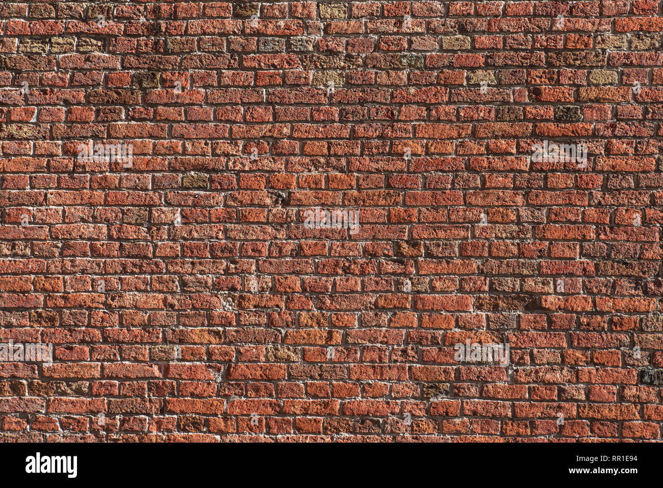 Rustic red brick wall Stock Photo - Alamy