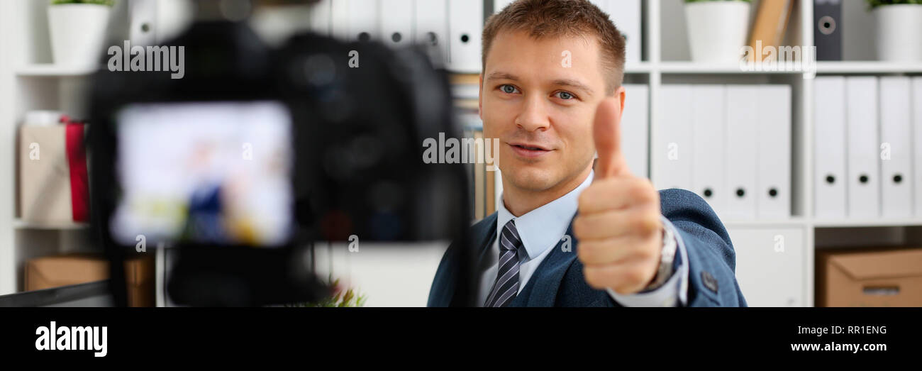 Male in suit and tie show confirm sign Stock Photo - Alamy