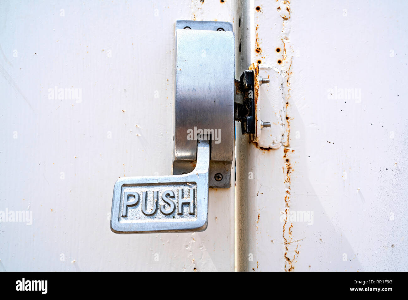 Push handle hi-res stock photography and images - Alamy