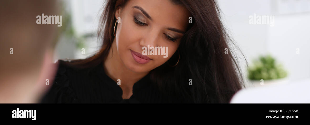 Smiling woman deliberate on problem portrait Stock Photo - Alamy