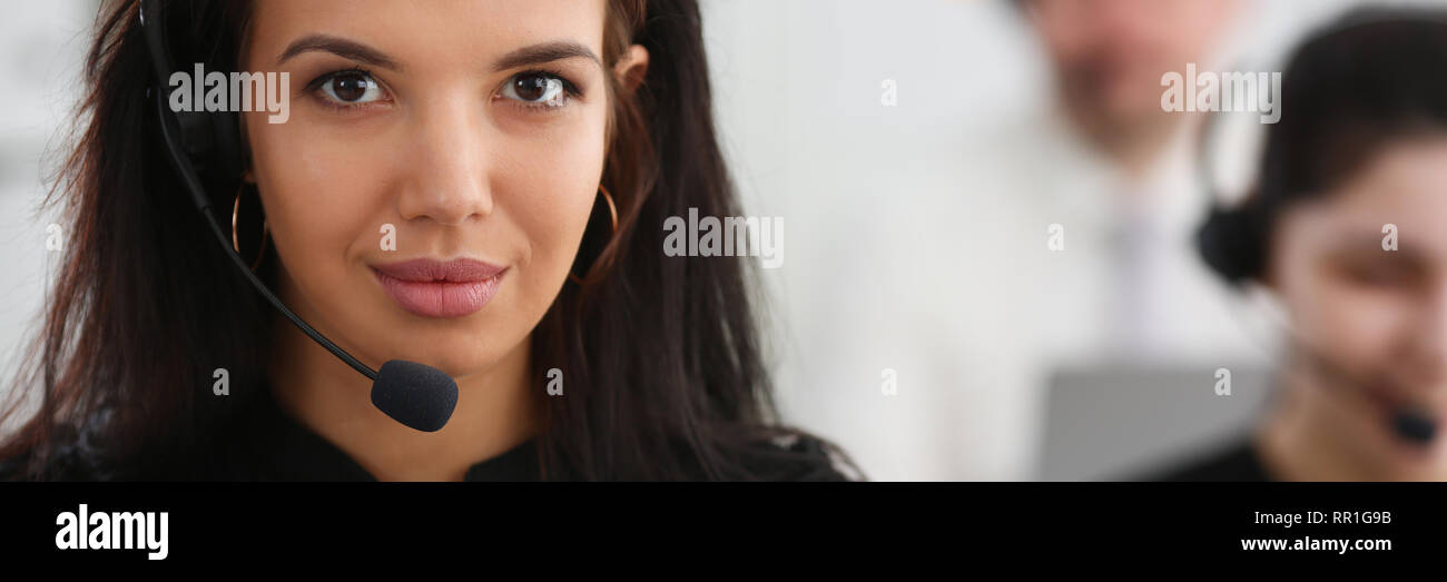 Three call centre service operators at work Stock Photo - Alamy