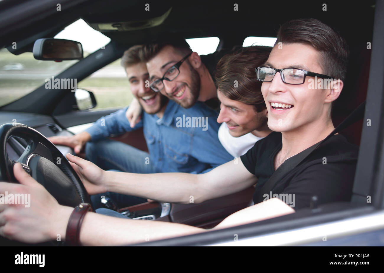 A young man rides in a car at high speed Stock Photo - Alamy