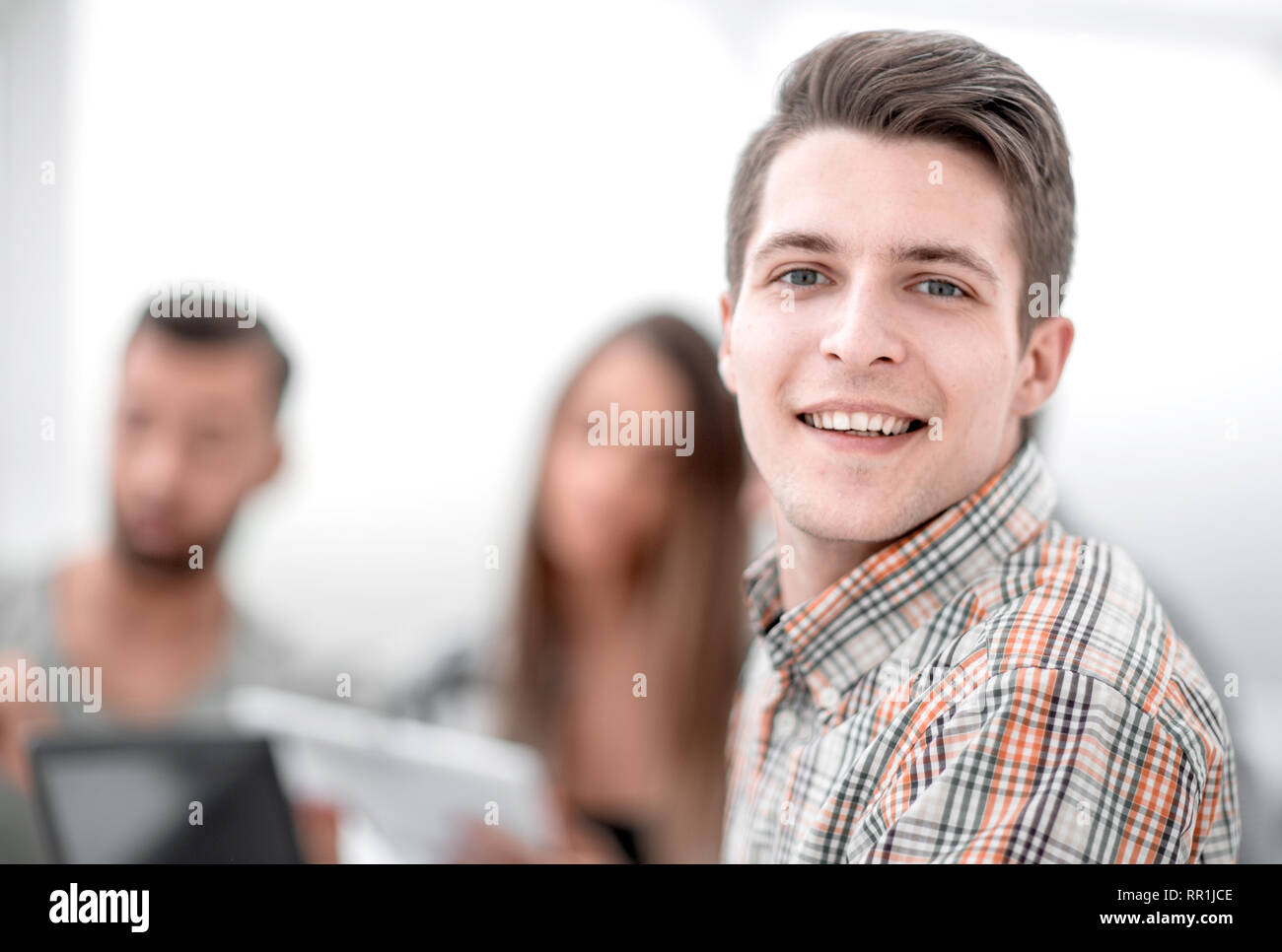 close up.successful employee on the background of the workplace Stock ...