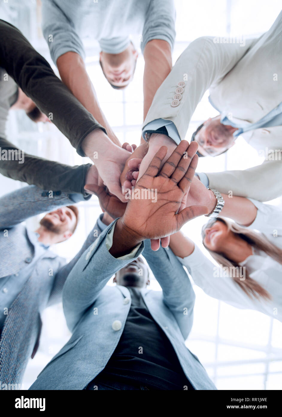 business background.business team making a stack of hands Stock Photo ...