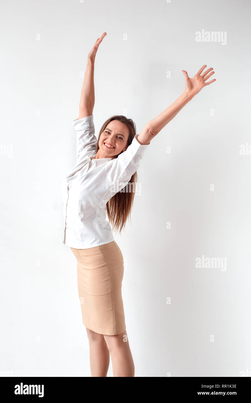 Freedom. Woman standing isolated on white hands up smiling happy side ...