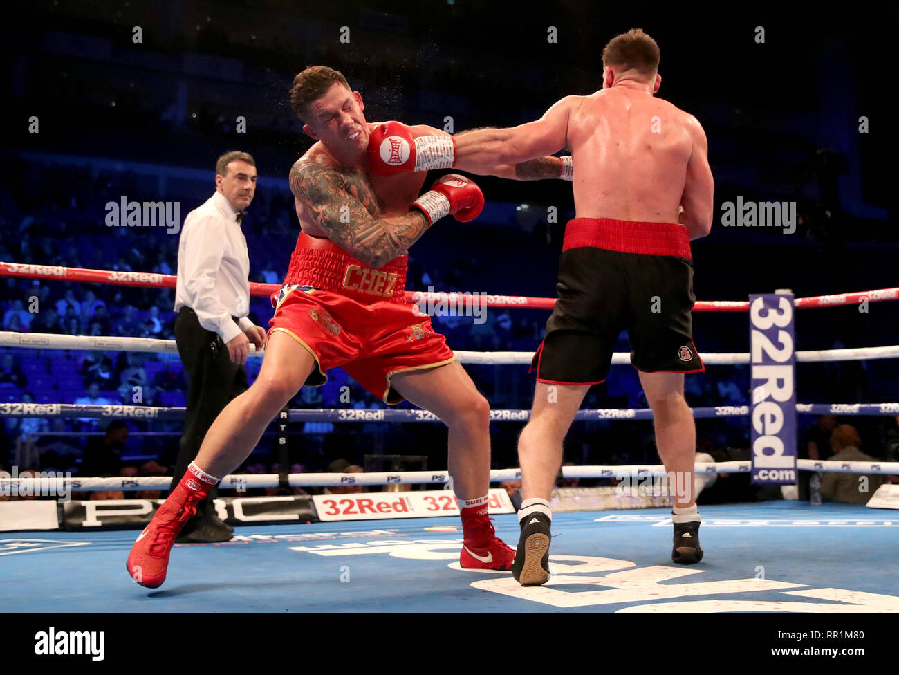 Kent Kauppinen (right) lands a punch on Chez Nihell as they compete in ...
