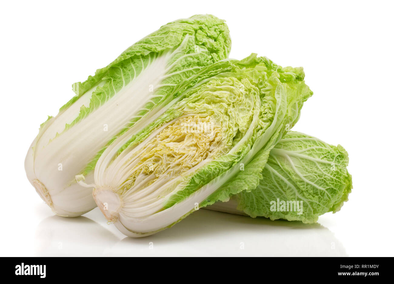 two chinese cabbage and half isolated on white background Stock Photo ...