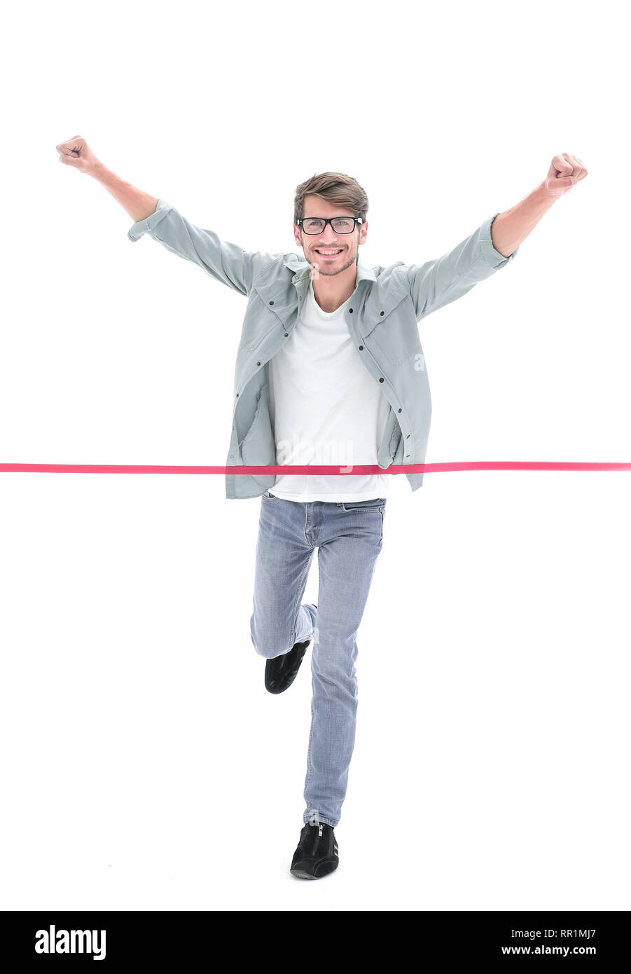 Happy businessman running through finishing line. Isolated on white ...