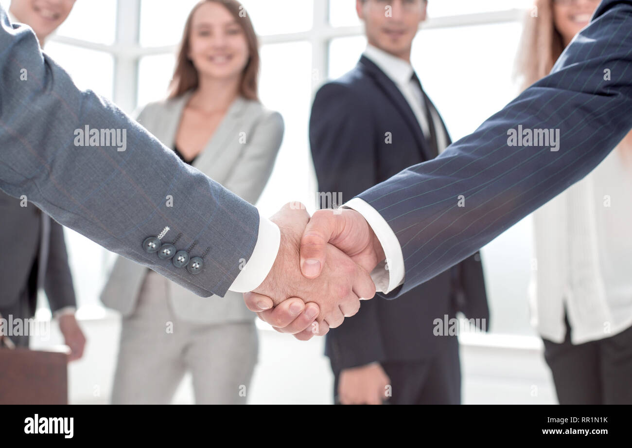 close up.handshake business partners in the office Stock Photo - Alamy