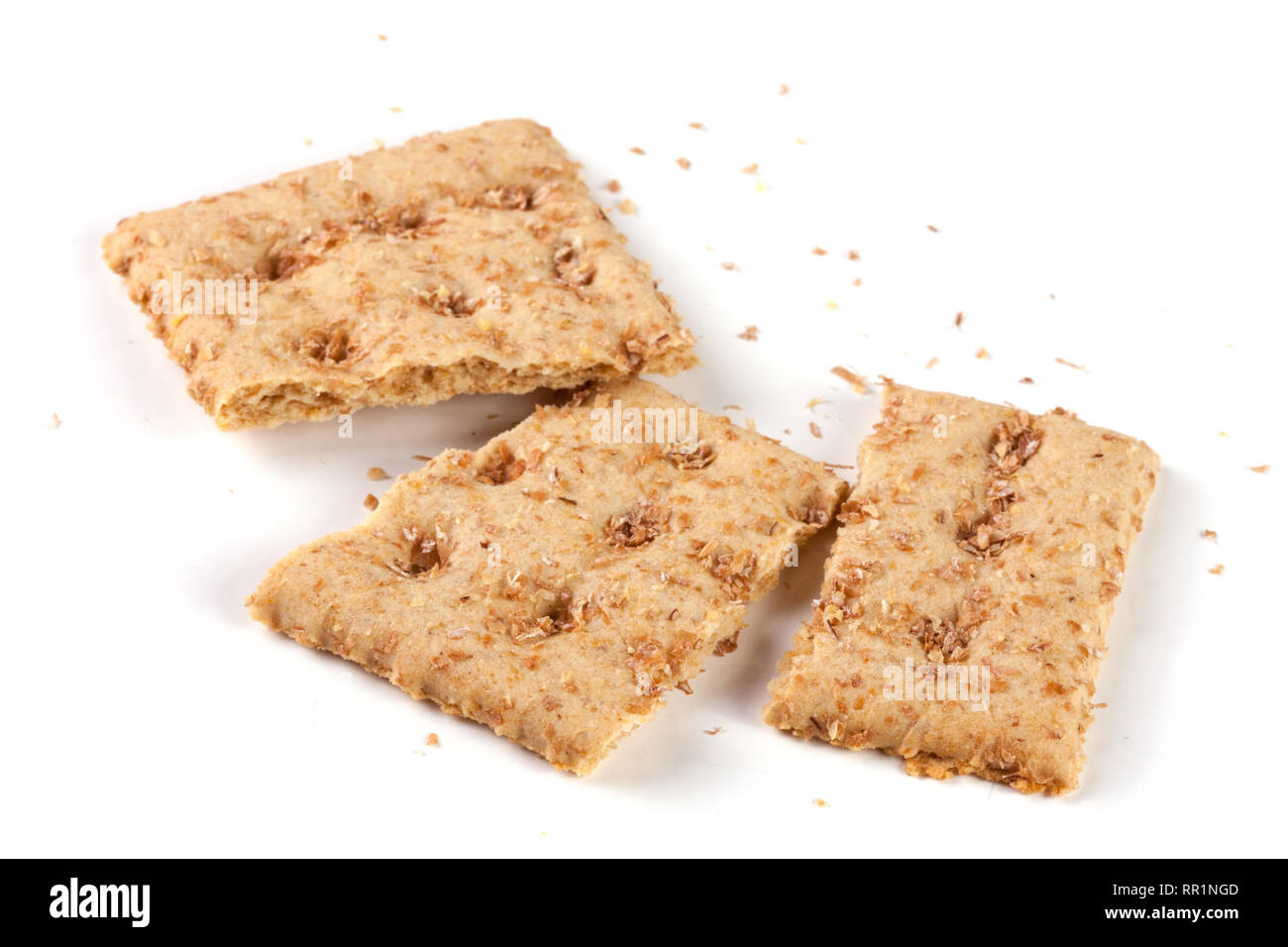 the broken grain crispbreads isolated on white background Stock Photo ...