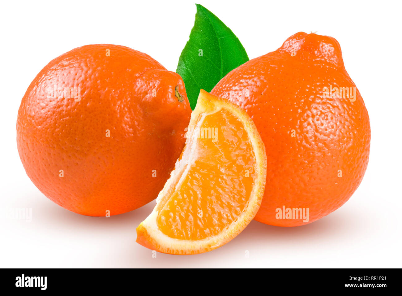 two orange tangerine or Mineola with slice and leaf isolated on white ...