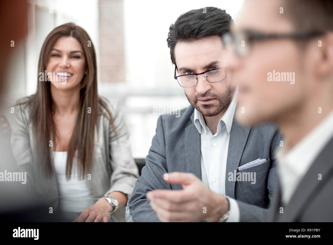 close up.the project Manager is talking to the employee at the meeting ...