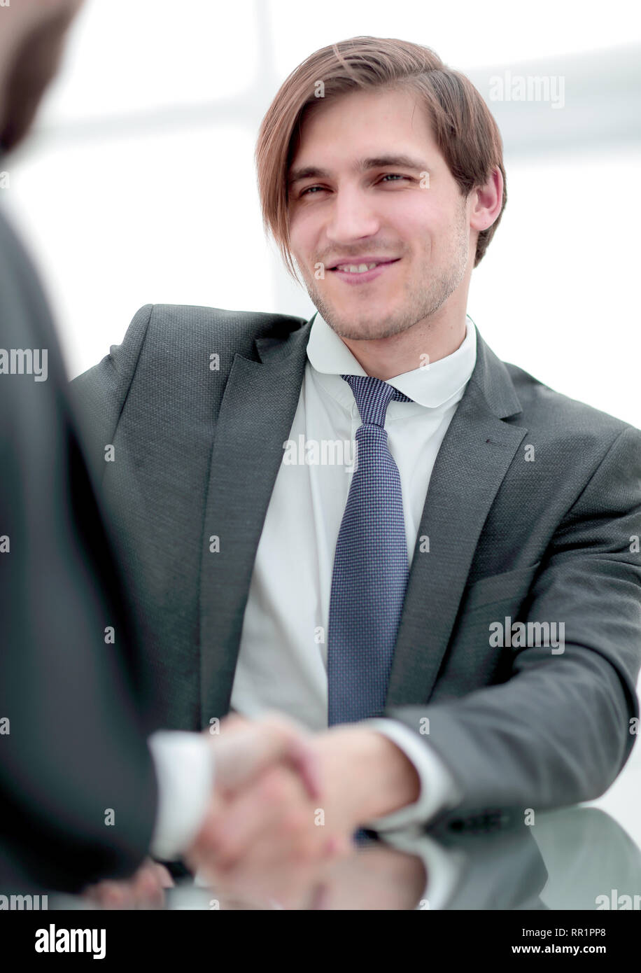 vertical photo.handshake business people Stock Photo - Alamy