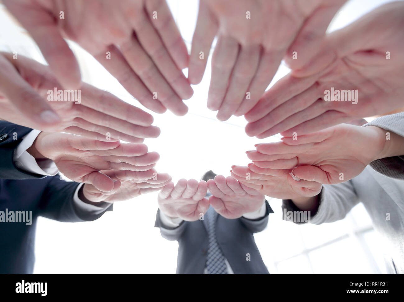 business team showing their unity Stock Photo - Alamy