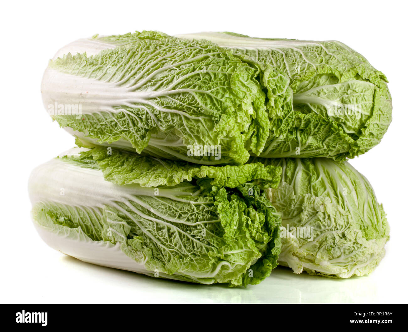 four chinese cabbage and half isolated on white background Stock Photo ...