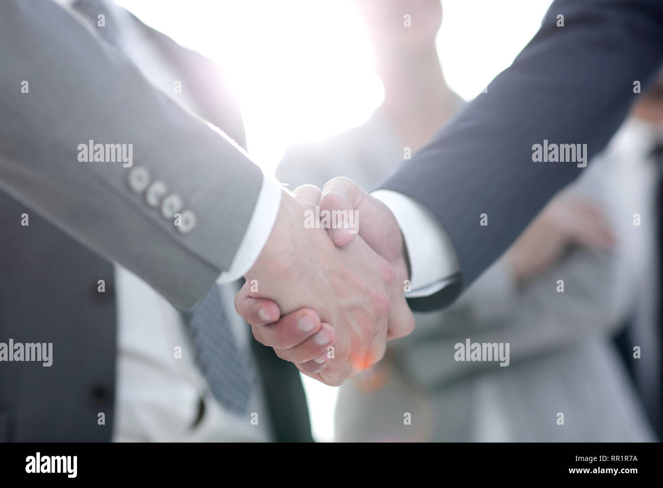 background image of handshake of business people Stock Photo - Alamy