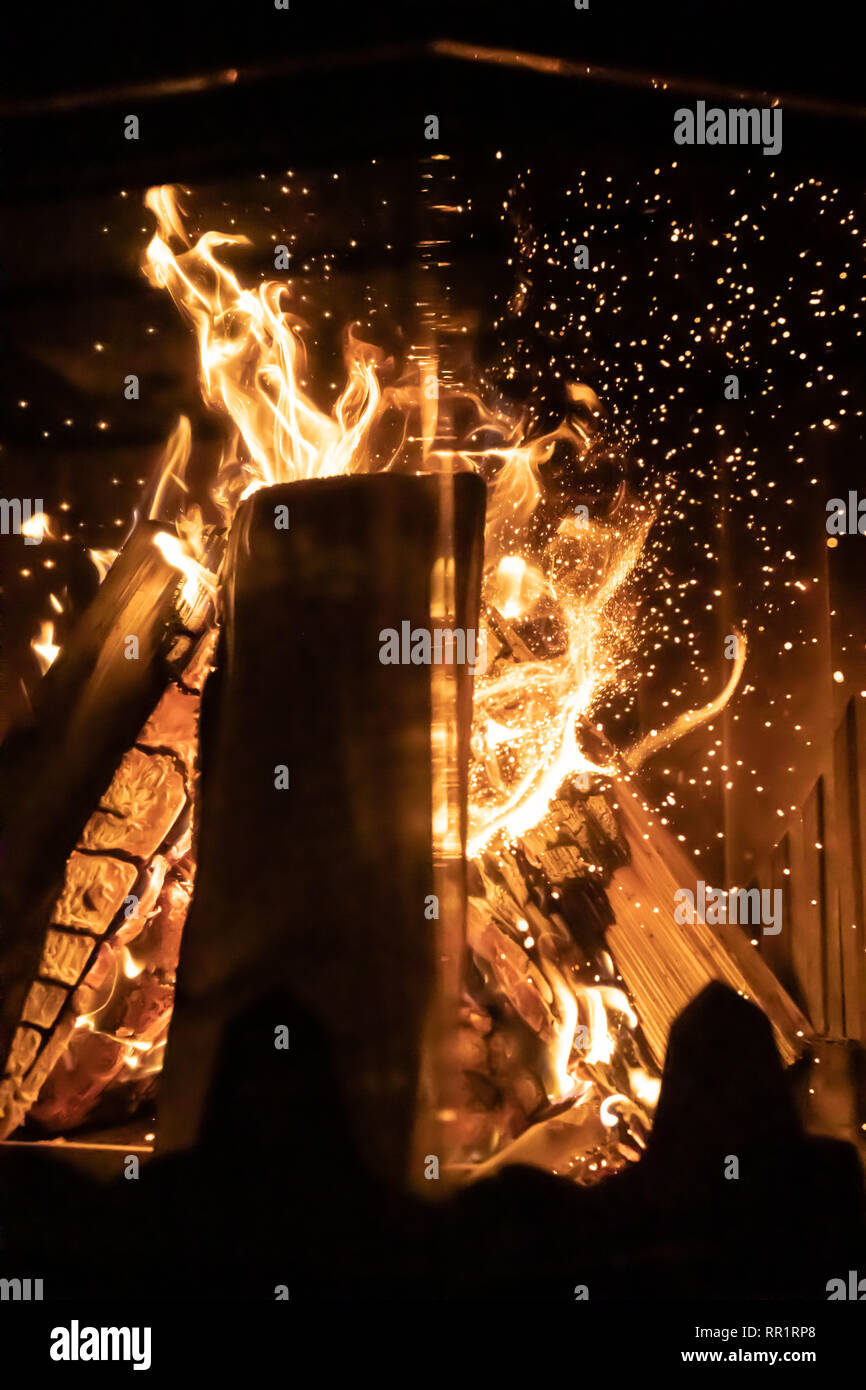 Fire in a open fire place Stock Photo - Alamy