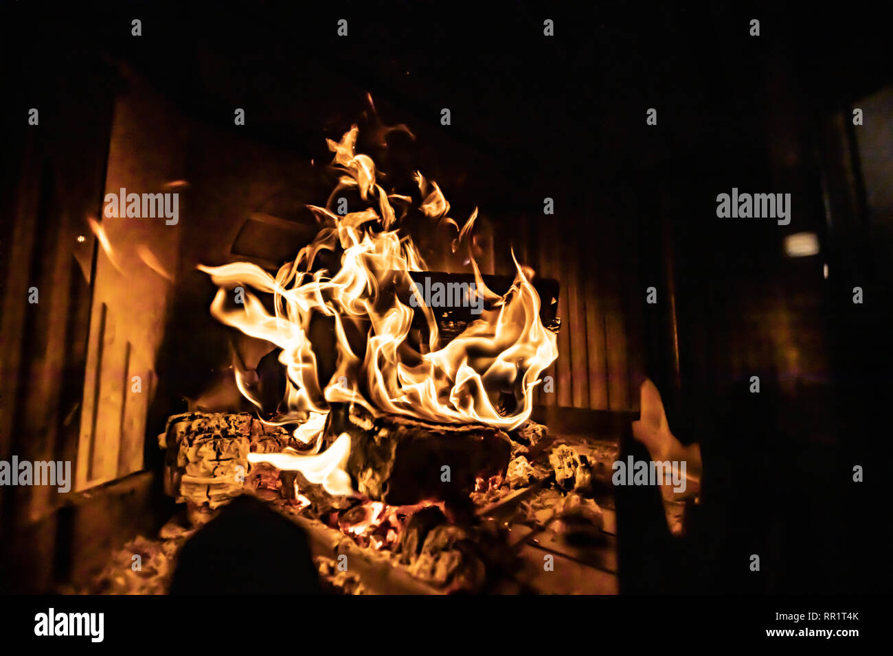 Fire in a open fire place Stock Photo - Alamy