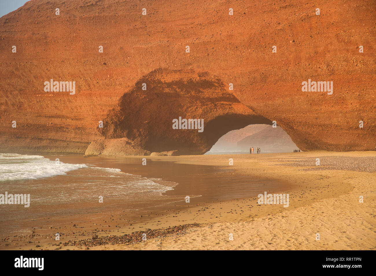 Arch on Legzira beach in Morocco. sunset Stock Photo - Alamy
