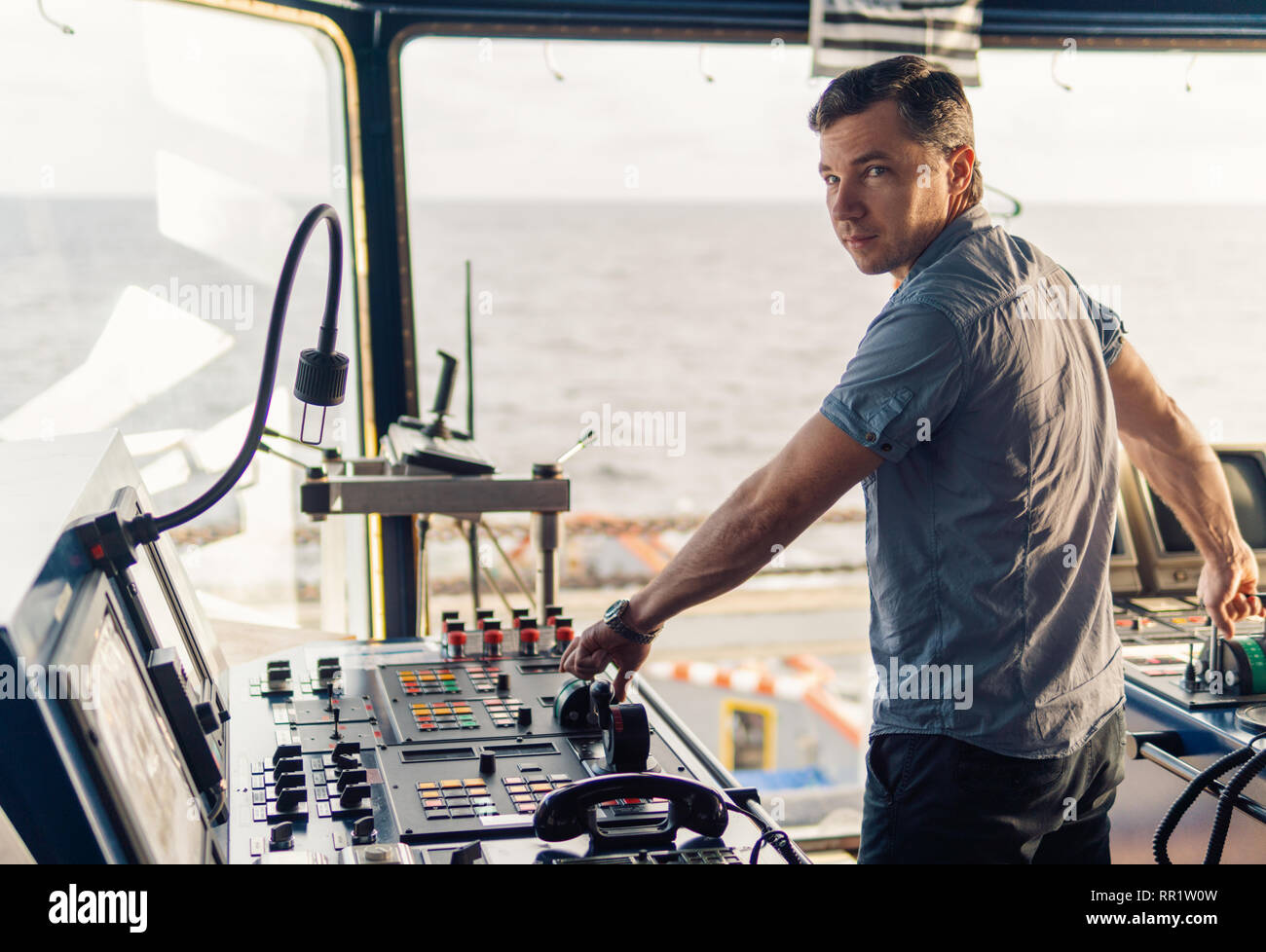 Marine navigational officer during navigational watch on Bridge Stock ...