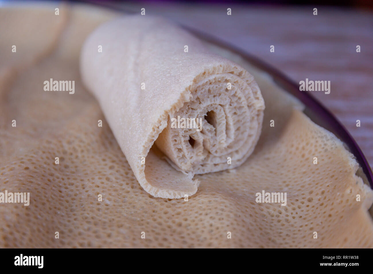 African food. Injera is a sourdough flatbread made from teff flour. It ...