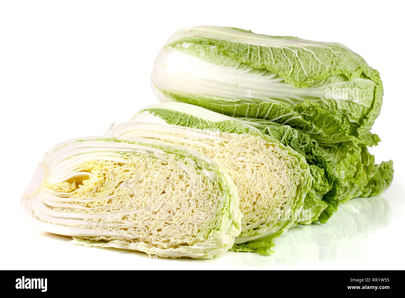 two chinese cabbage and half isolated on white background Stock Photo ...