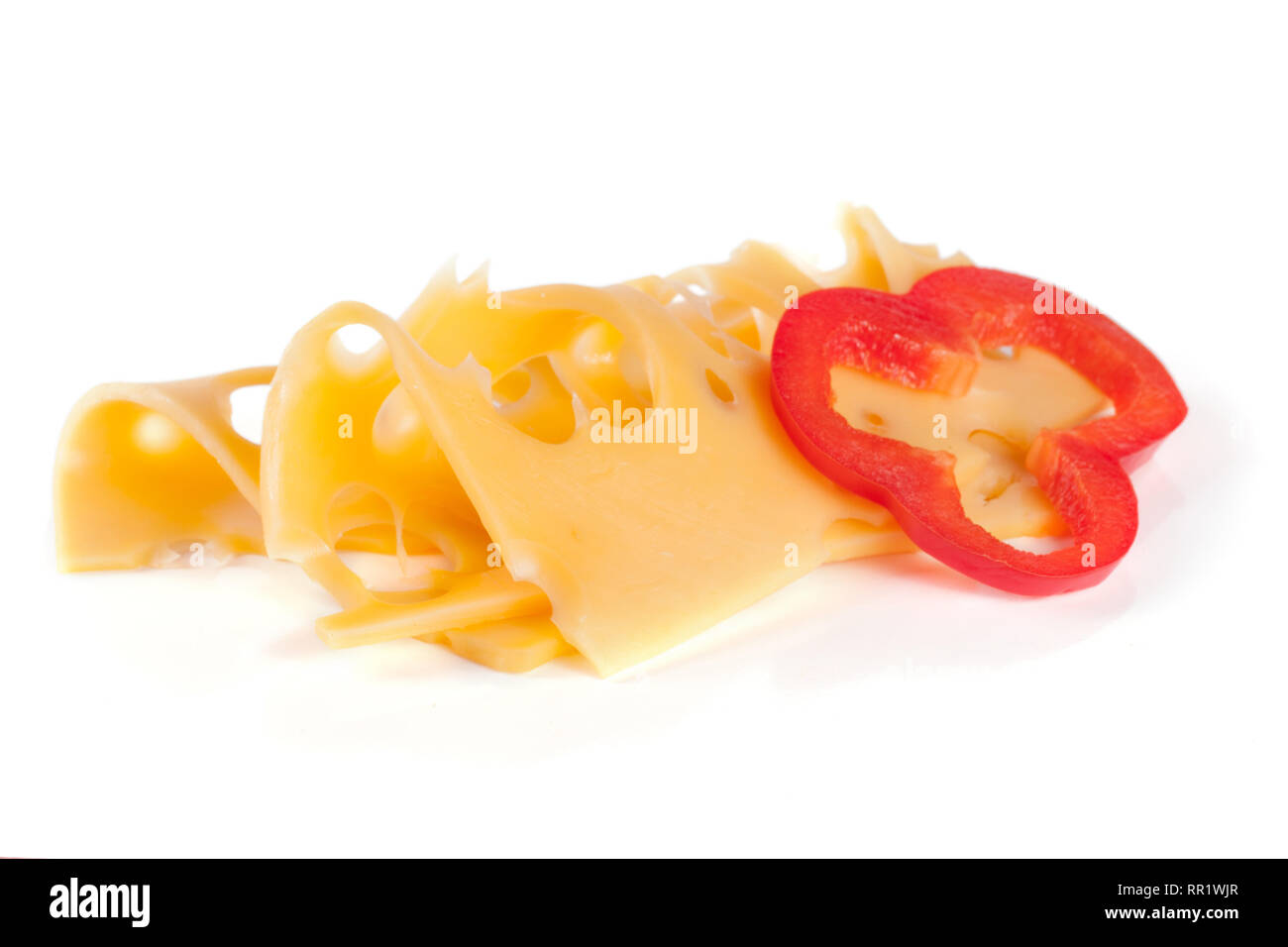 cheese slice with bell pepper isolated on white background cutout Stock ...