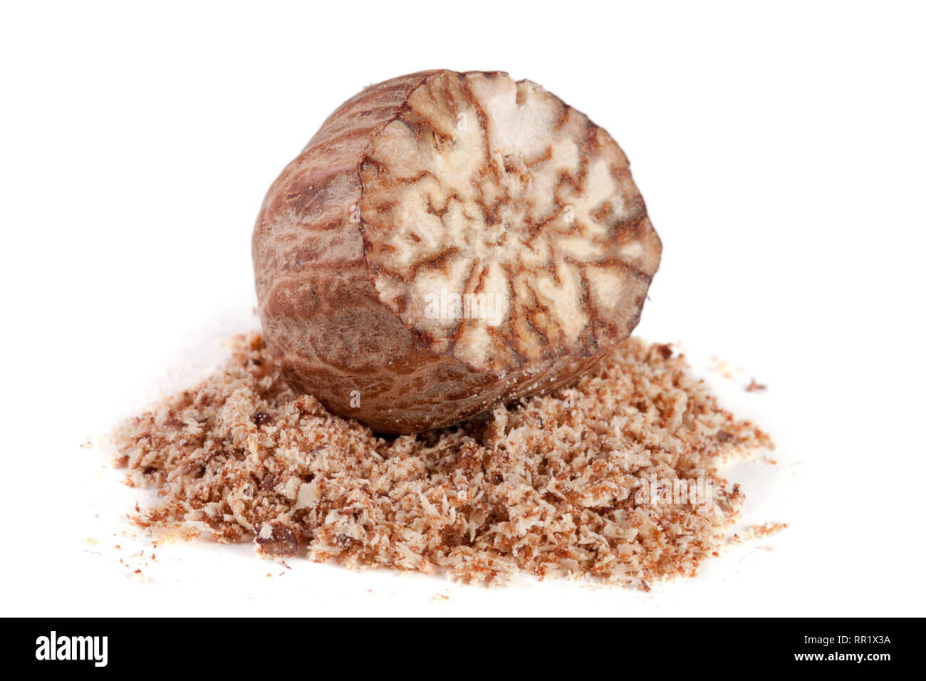 one nutmeg and powder isolated on white background Stock Photo - Alamy