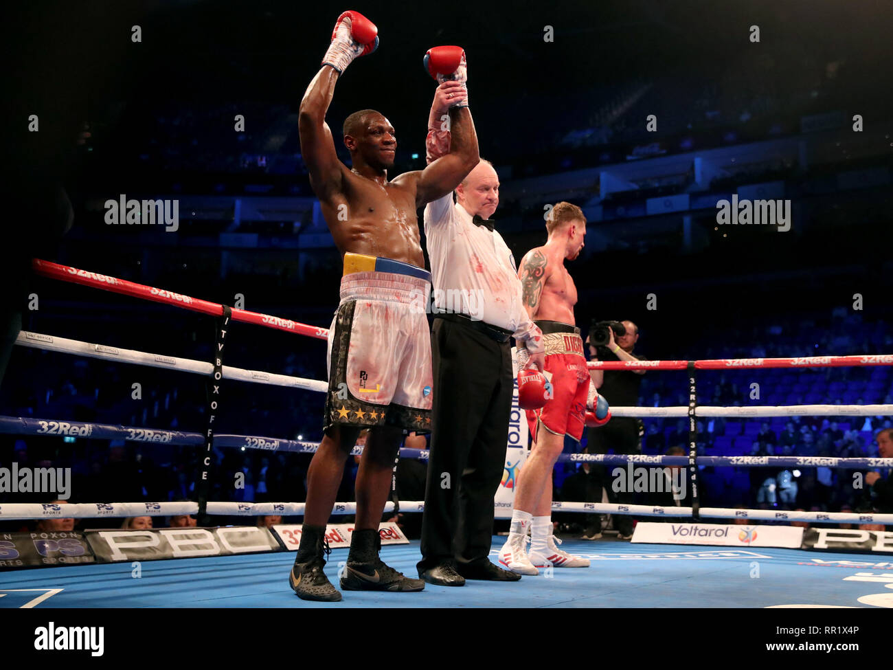 Andre Sterling (left) celebrates his victory over Ricky Summers during ...
