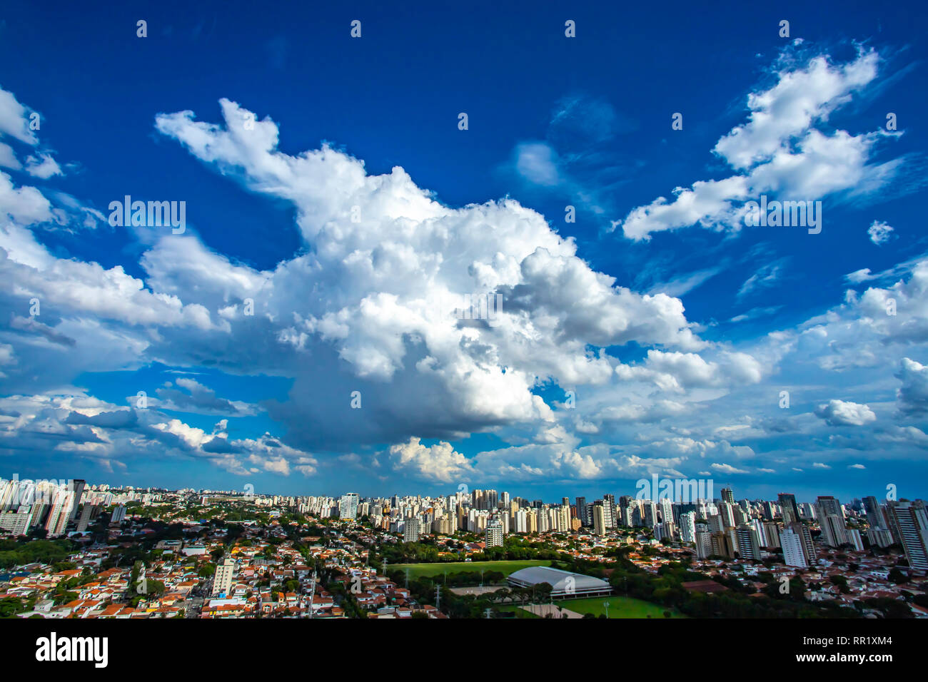 Big White clouds at sky. Amazing view over a city, the city of Sao ...