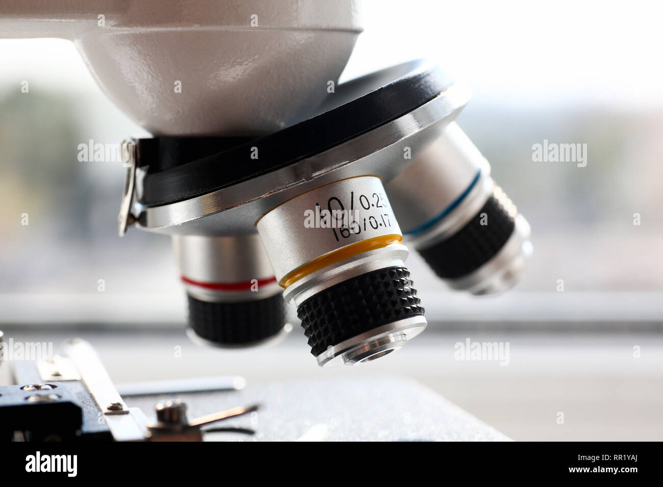 The head microscope on the background of Stock Photo - Alamy