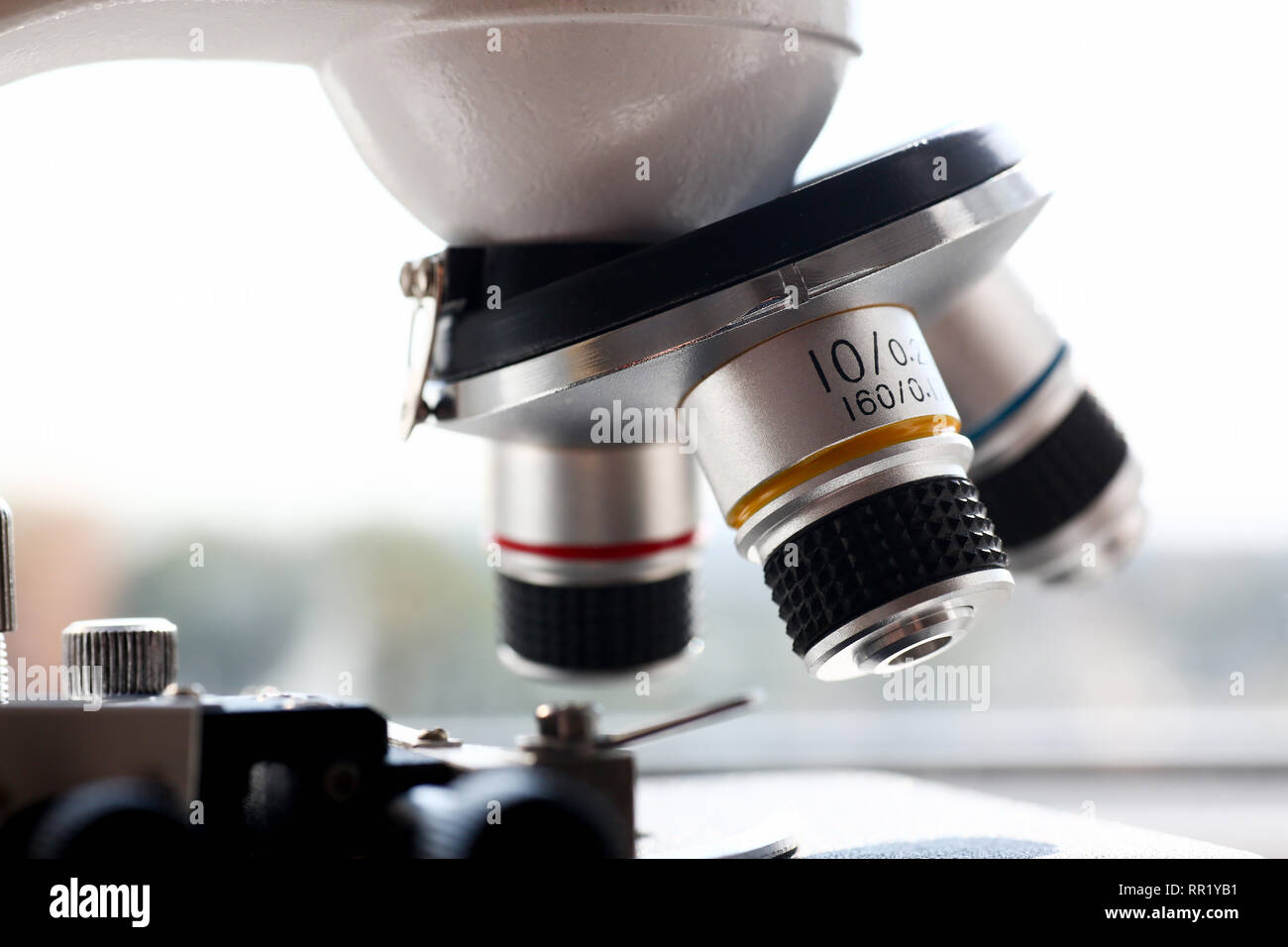 The head microscope on the background of Stock Photo - Alamy