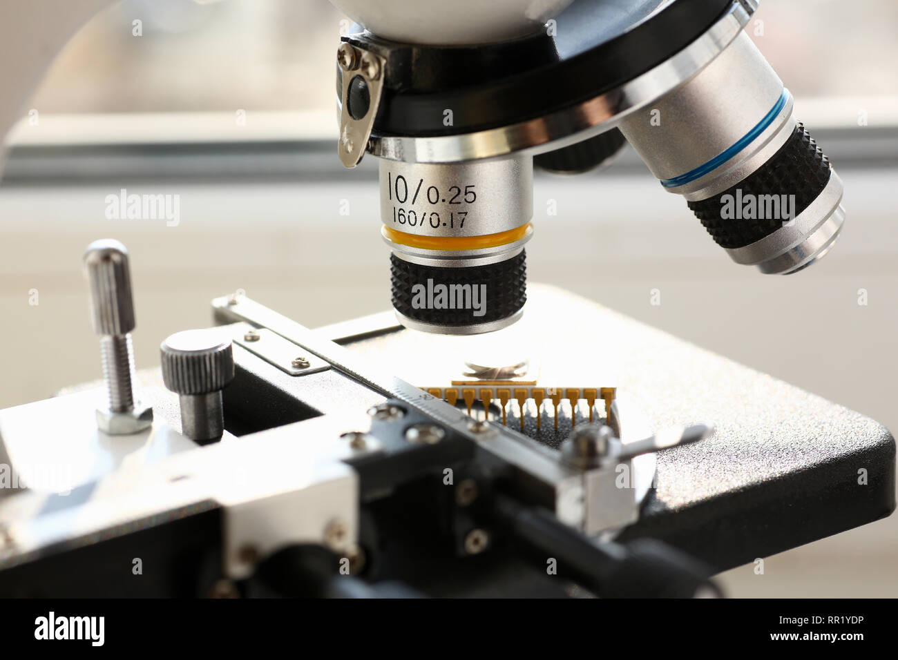 The head microscope on the background of Stock Photo - Alamy