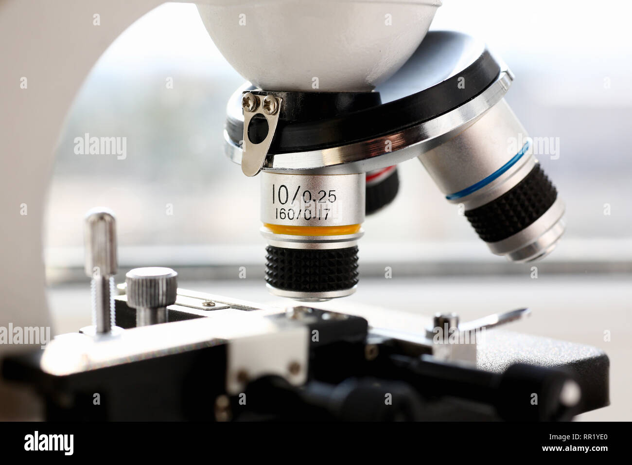 The head microscope on the background of Stock Photo - Alamy