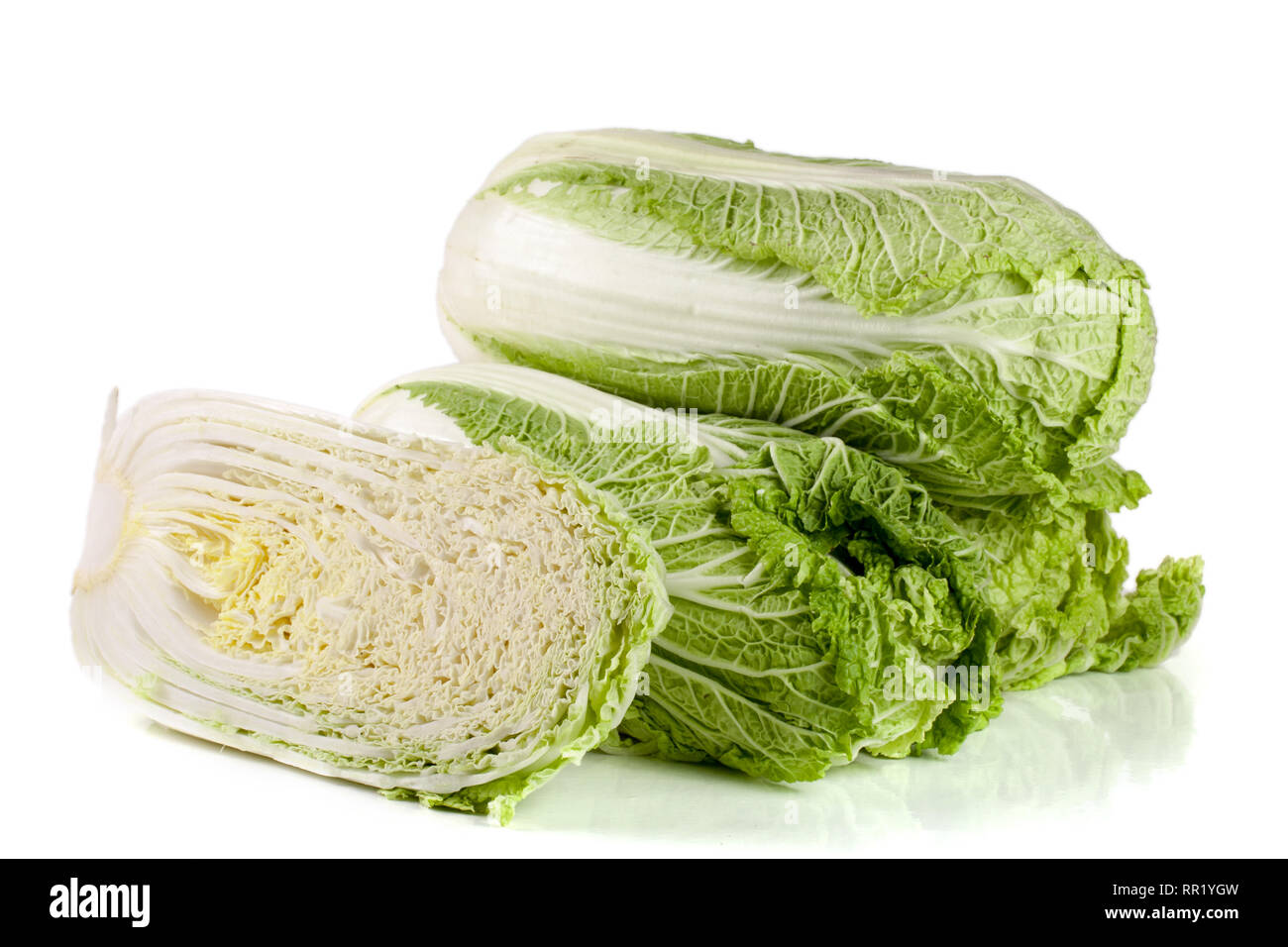 three chinese cabbage and half isolated on white background Stock Photo ...