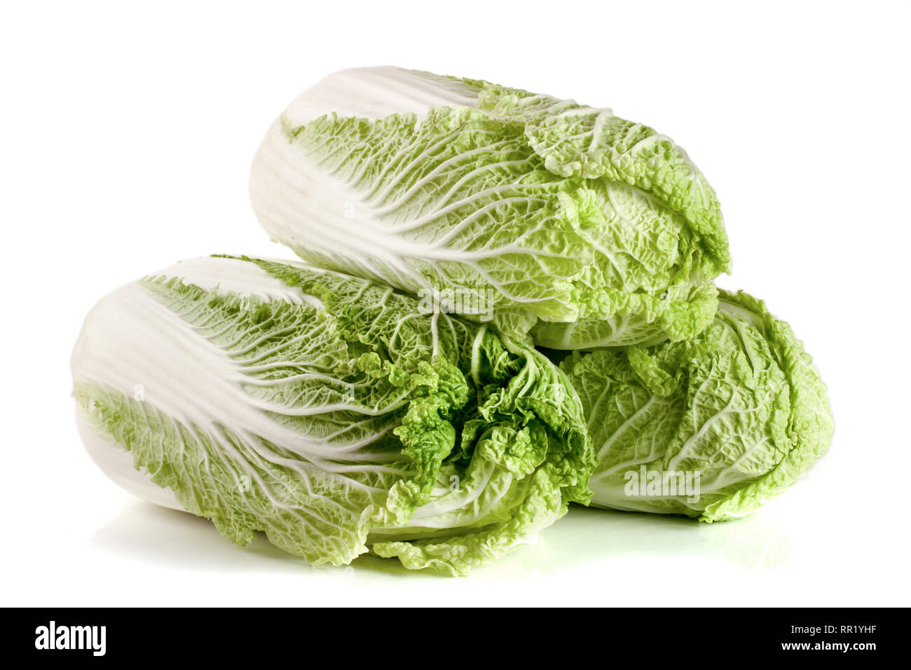 three chinese cabbage and half isolated on white background Stock Photo ...
