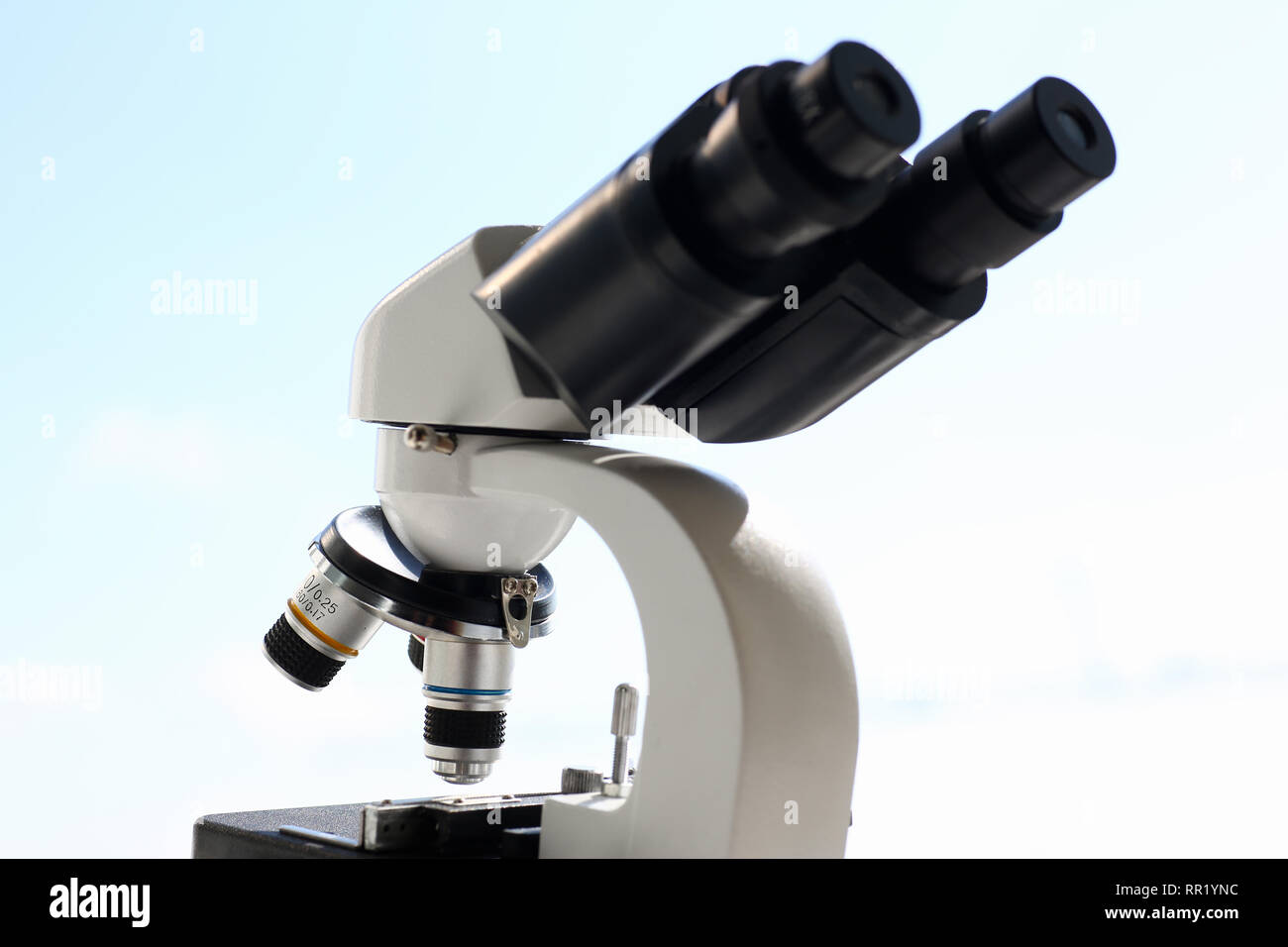 The head microscope on the background of Stock Photo - Alamy