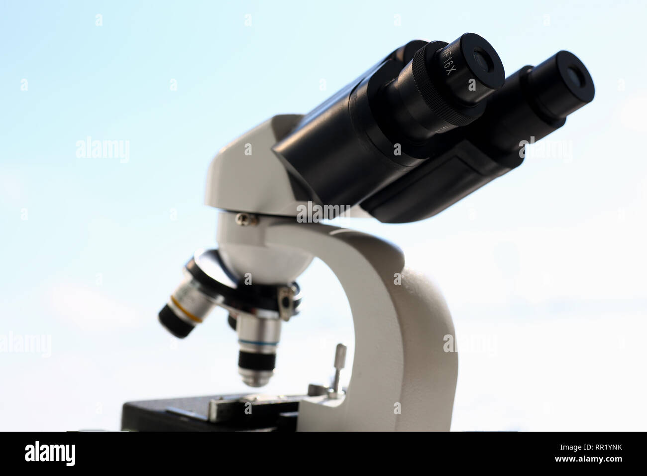 The head microscope on the background of Stock Photo - Alamy